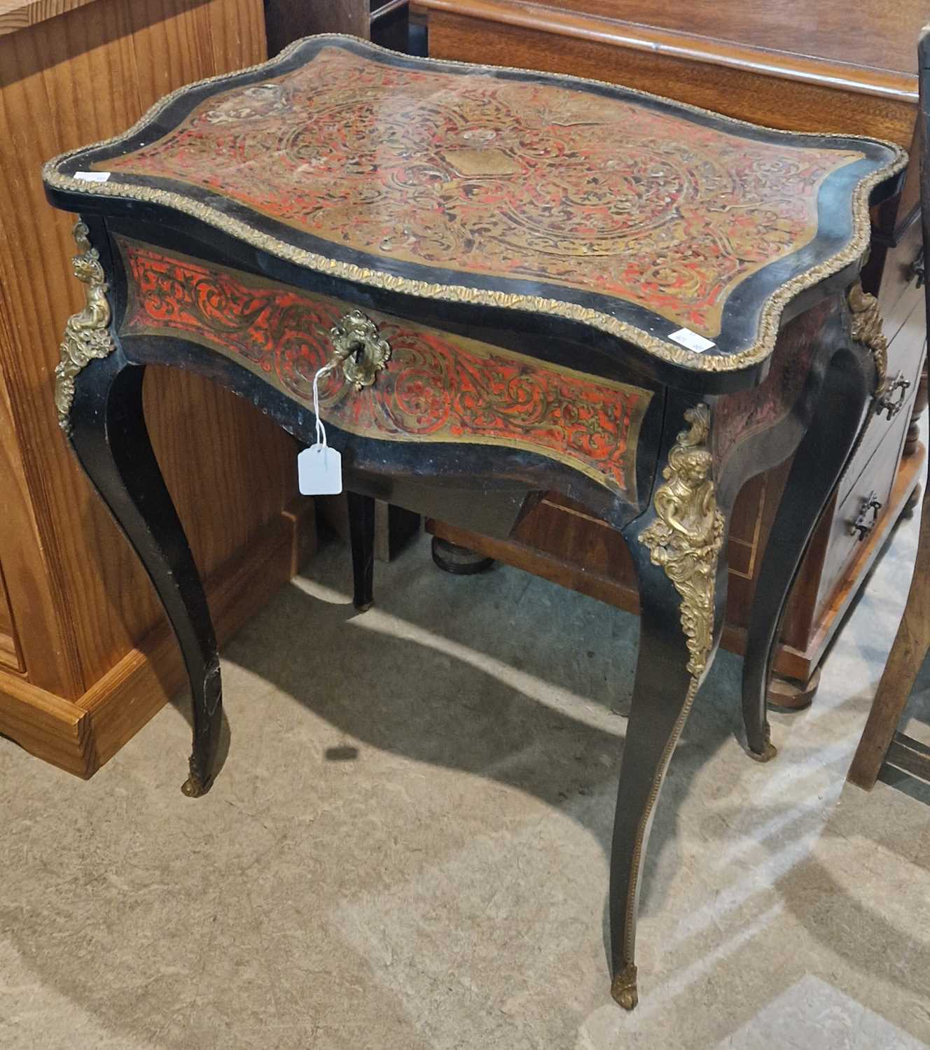 Lot 944 - A 19th century French boulle-work table by