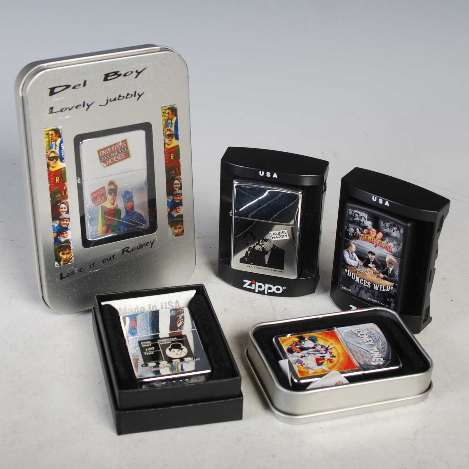 Lot 281 - Three boxed Zippo lighters and two others